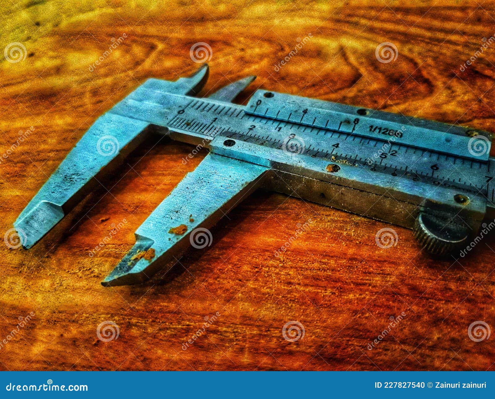 Old Calippers on the table stock photo. Image of wood - 227827540