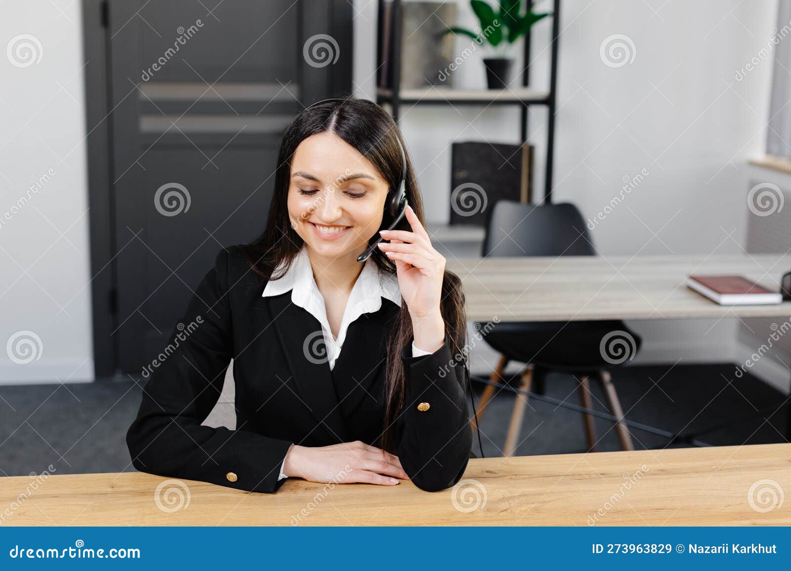 Call Center Agent with Headset Working on Support Hotline in Modern ...