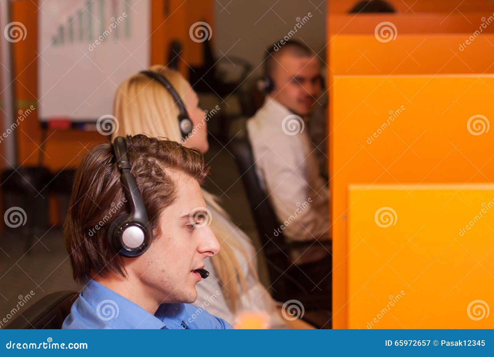 Call center agents at work stock image. Image of caucasian - 65972657