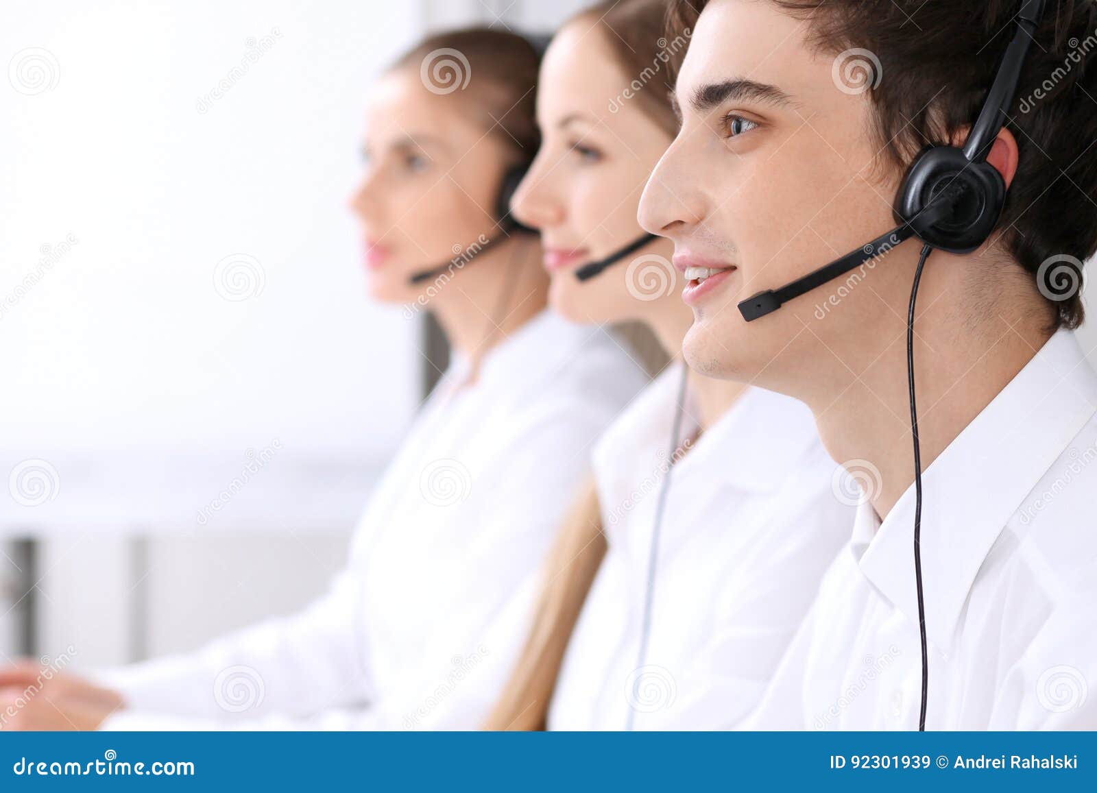 Call Center. Focus on a Man in Headset Stock Image - Image of ...