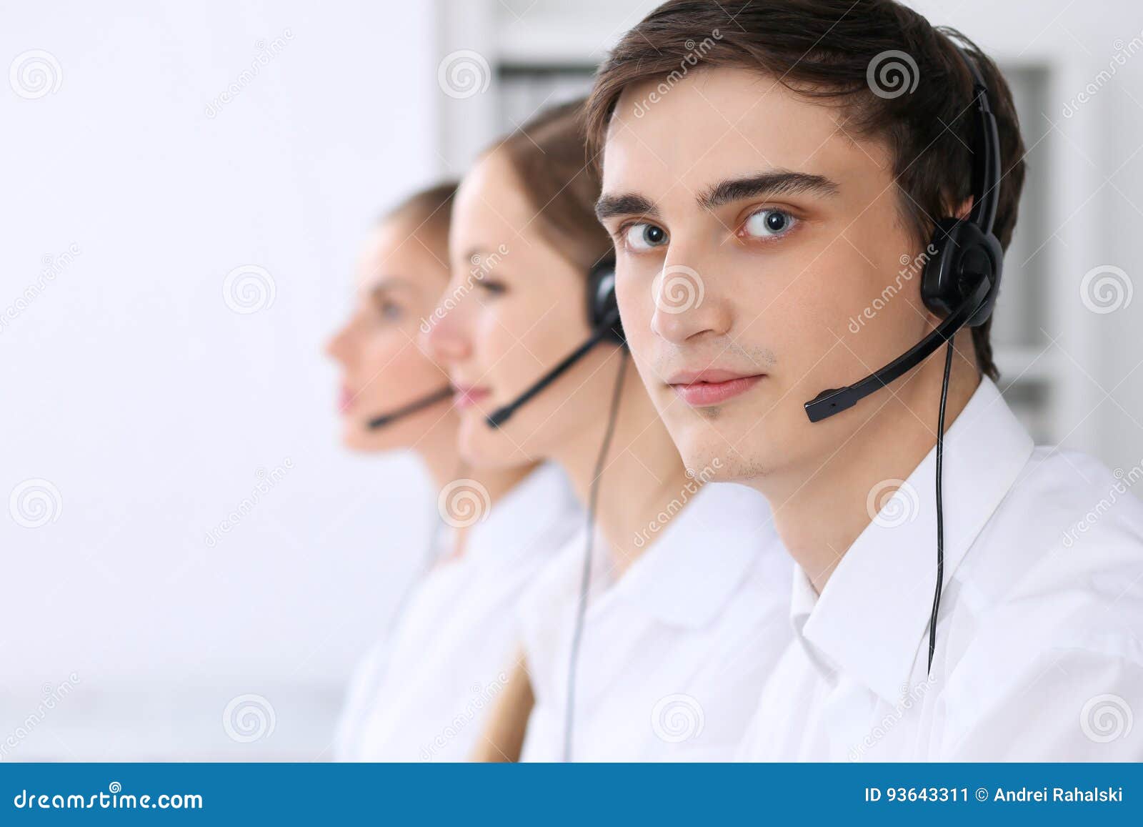 Call Center. Focus on a Man in Headset Stock Image - Image of colleague ...