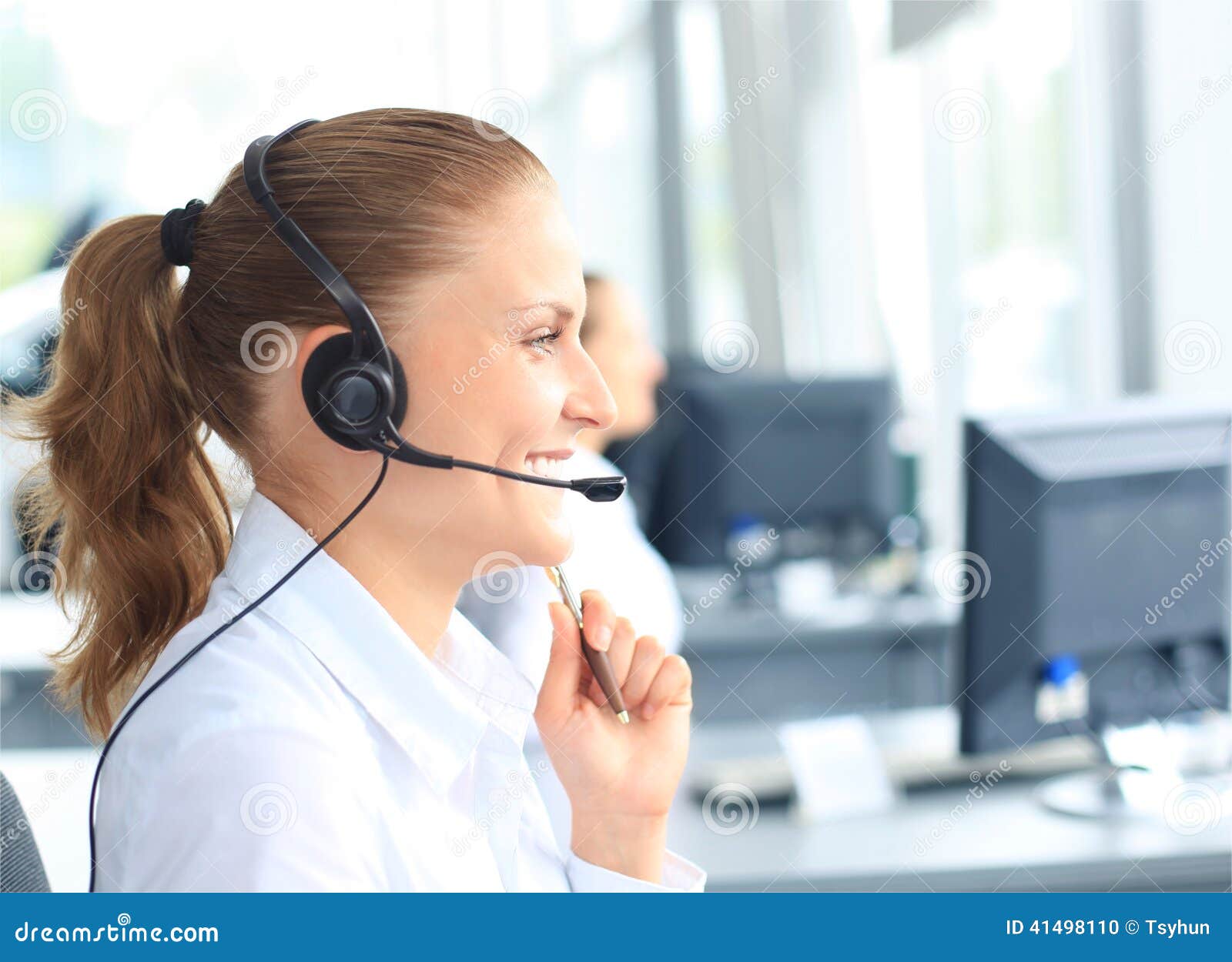 Call center operator stock photo. Image of confident - 41498110
