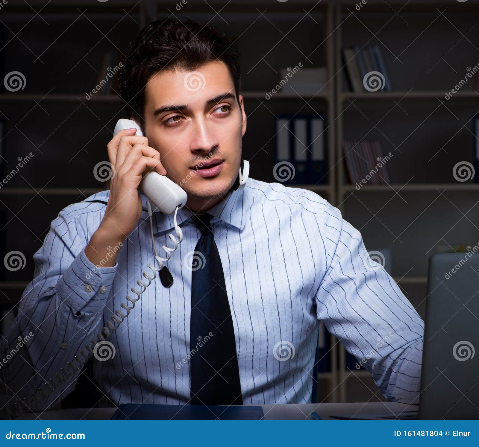 Call Center Operator Talking To Customer during Night Shift Stock Photo ...