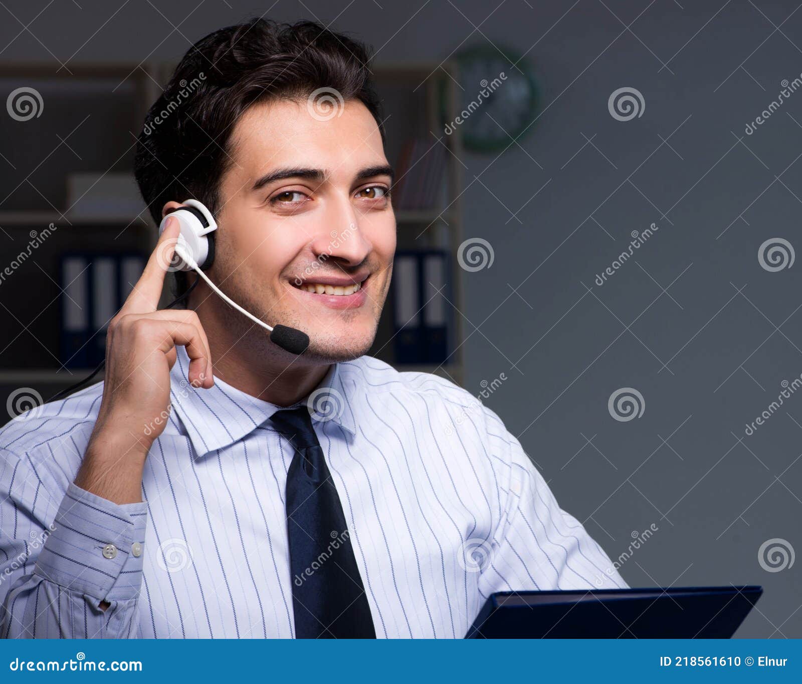 Call Center Operator Talking To Customer during Night Shift Stock Photo ...