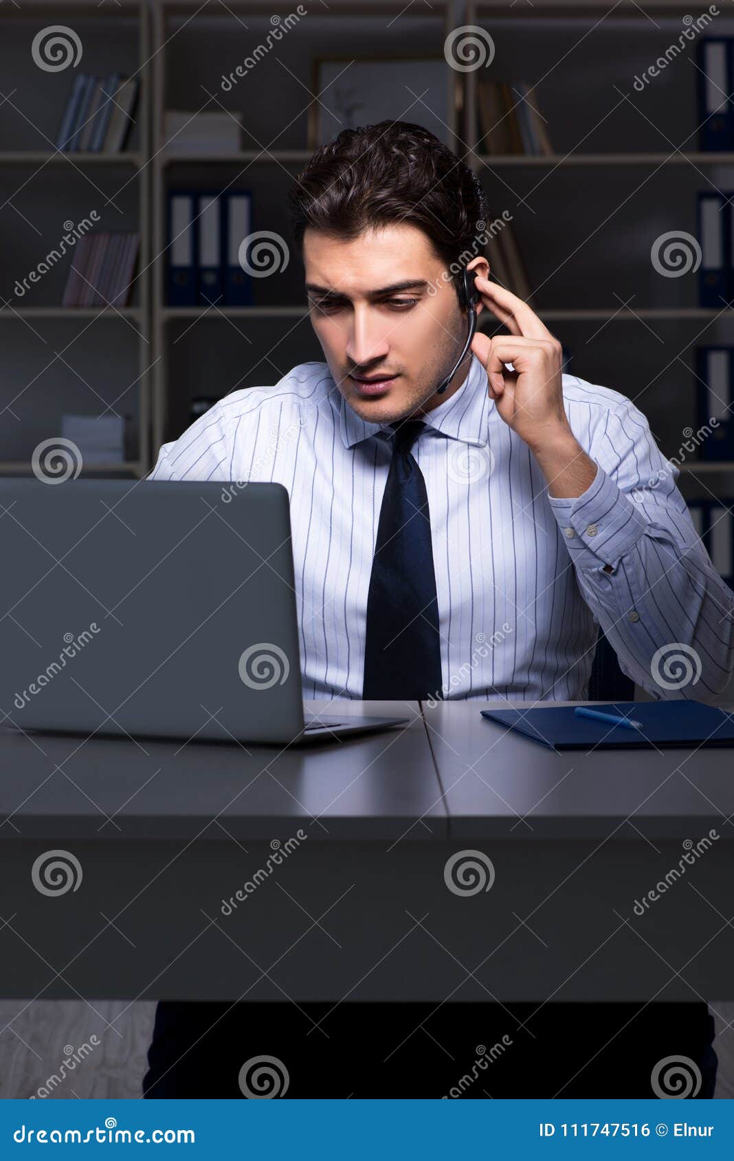 The Call Center Operator Talking To Customer during Night Shift Stock ...