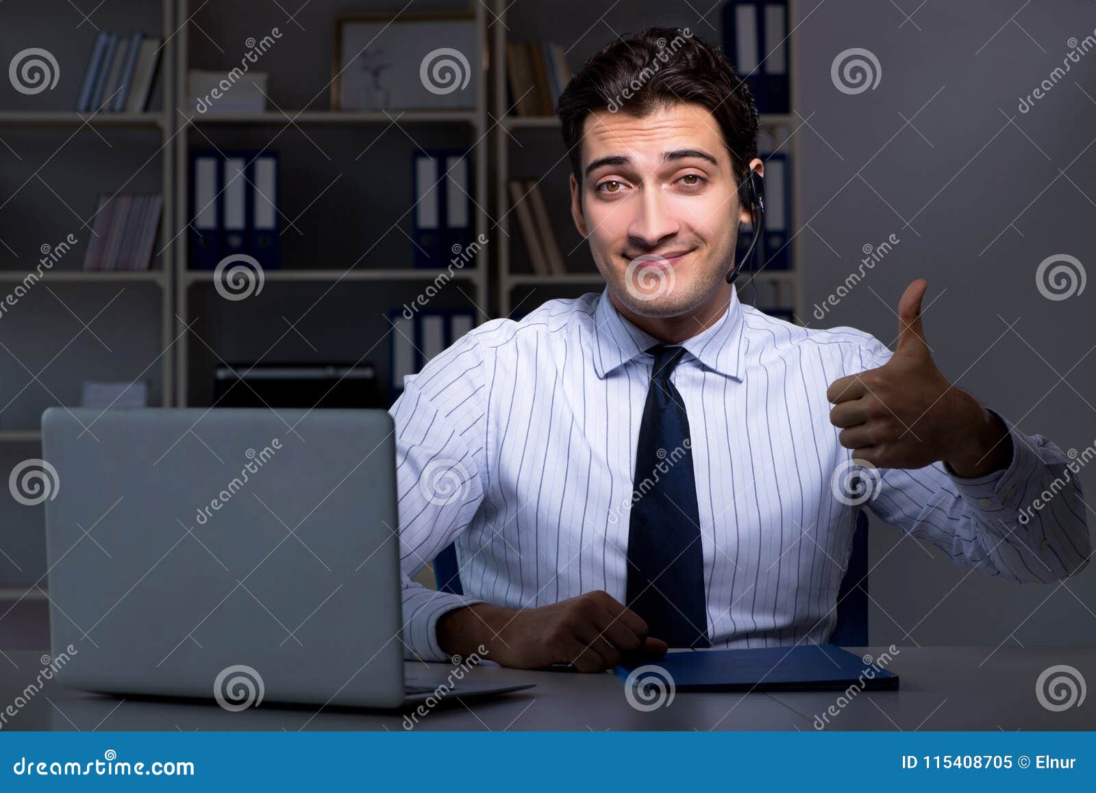 The Call Center Operator Talking To Customer during Night Shift Stock ...