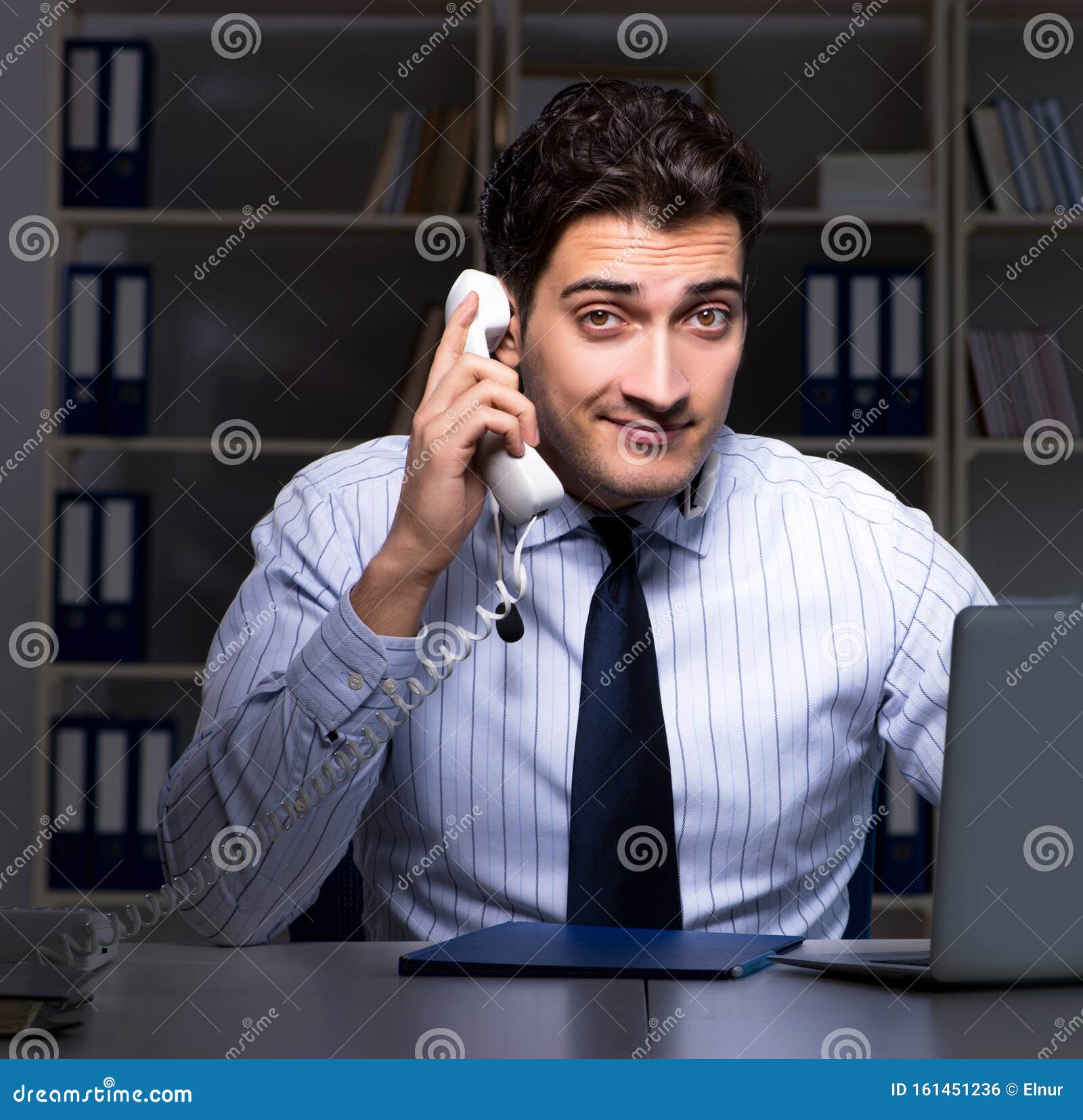 Call Center Operator Talking To Customer during Night Shift Stock Photo ...