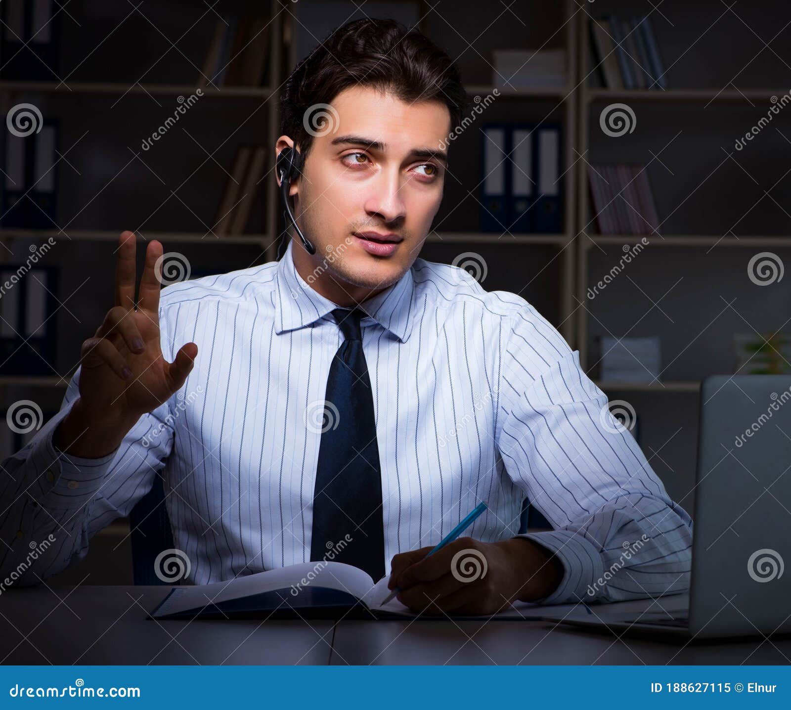 Call Center Operator Talking To Customer during Night Shift Stock Image ...