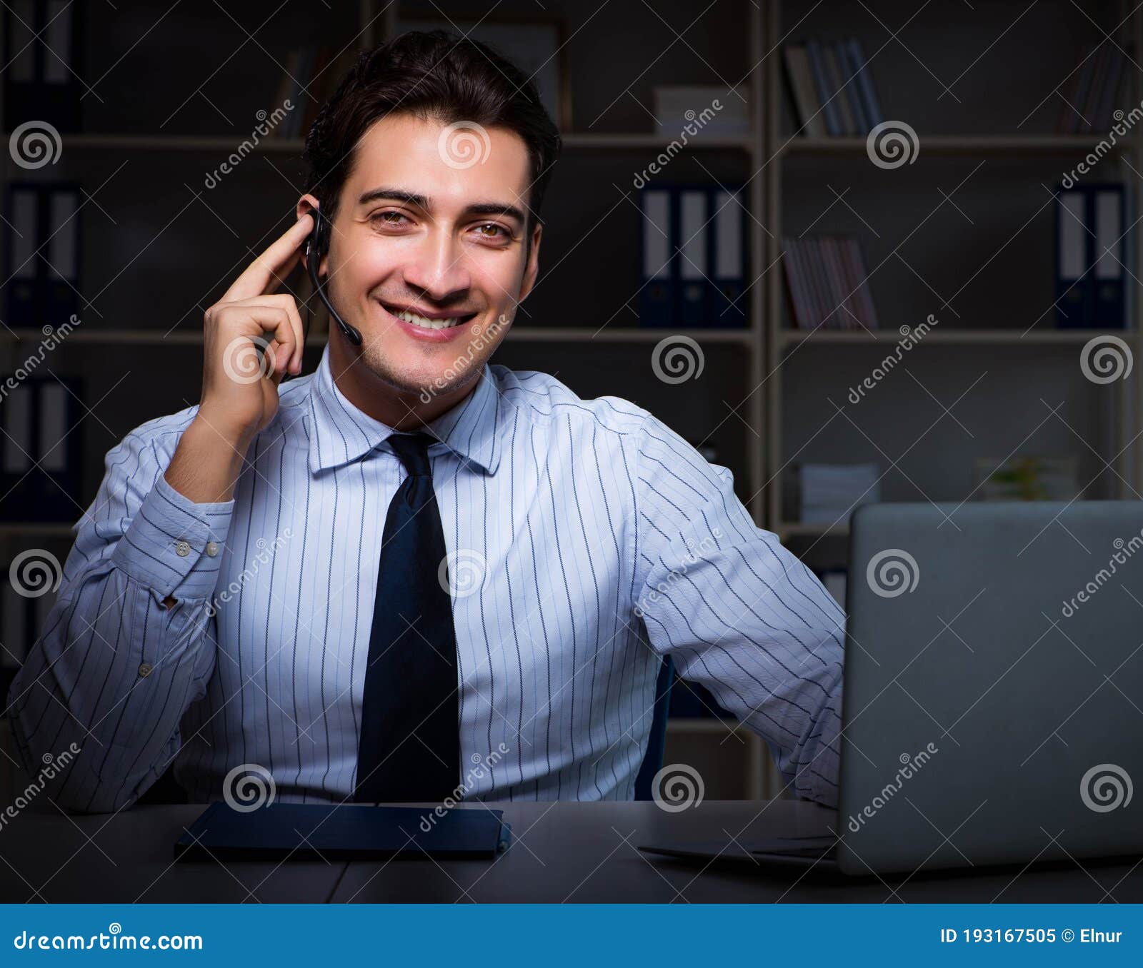 Call Center Operator Talking To Customer during Night Shift Stock Image ...