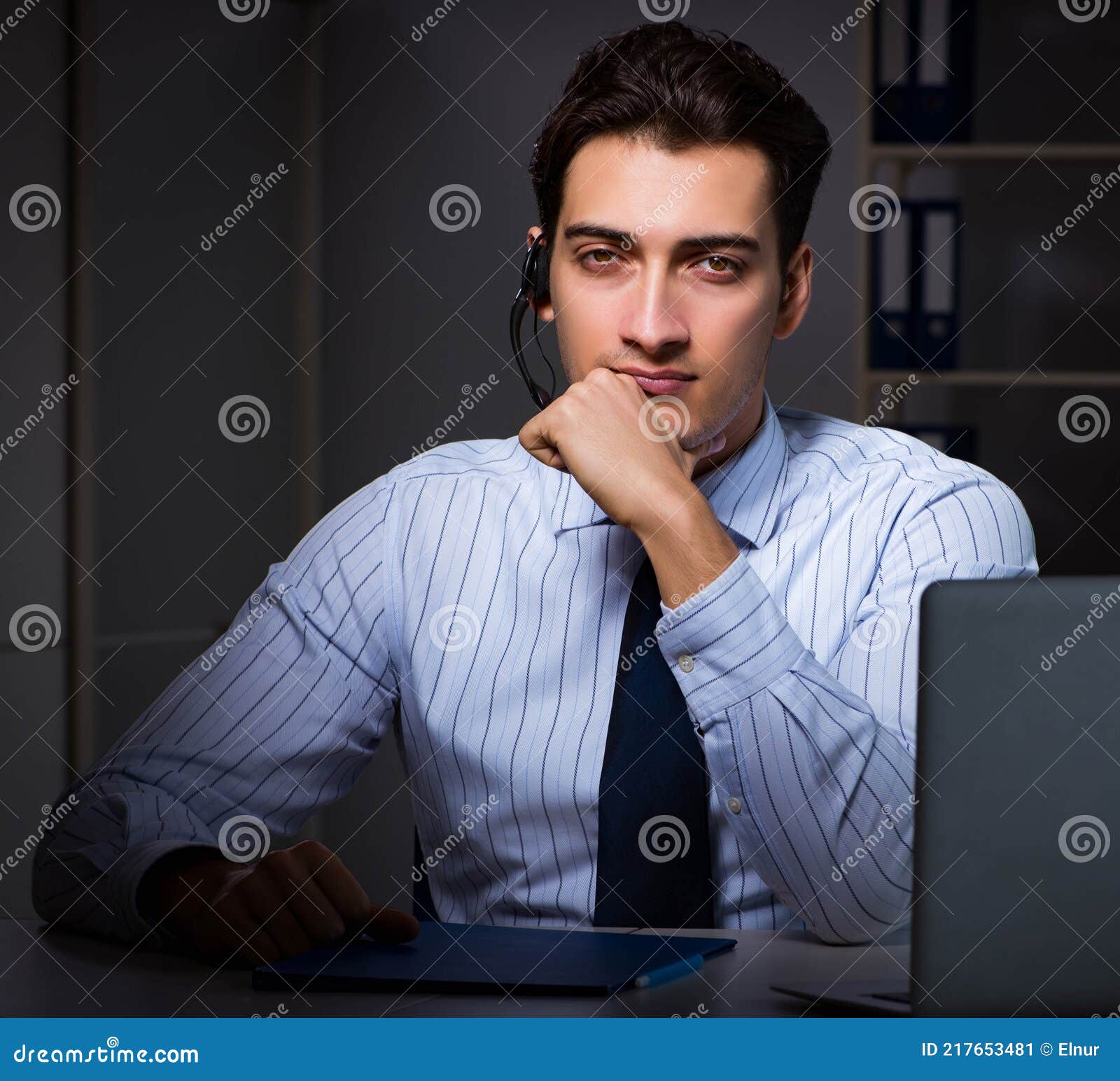 Call Center Operator Talking To Customer during Night Shift Stock Image ...