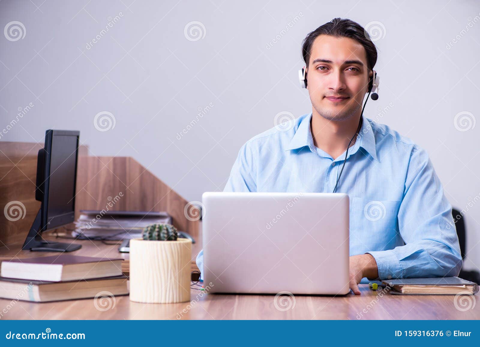 Call Center Operator Working at His Desk Stock Photo - Image of ...