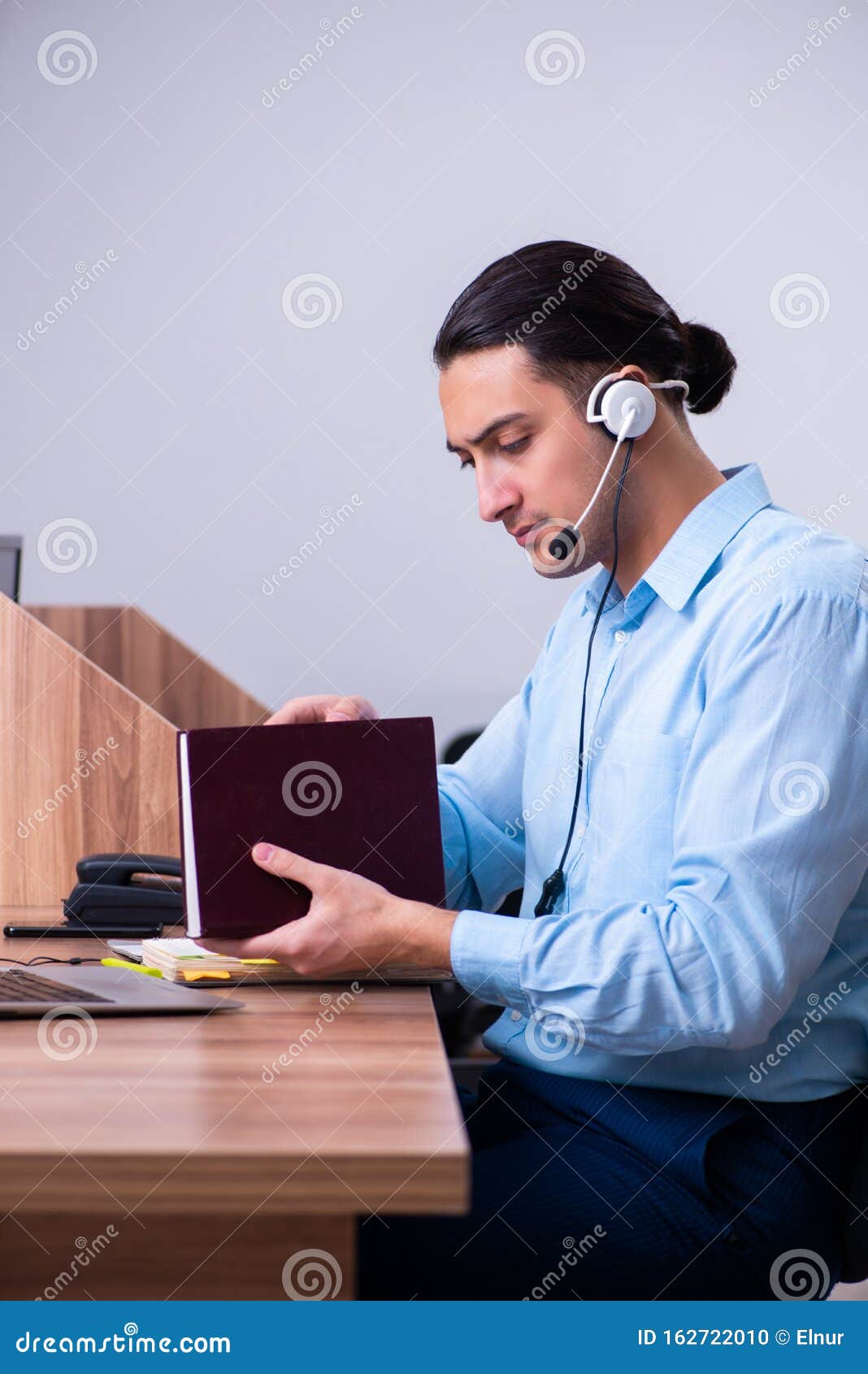 Call Center Operator Working at His Desk Stock Photo - Image of desk ...