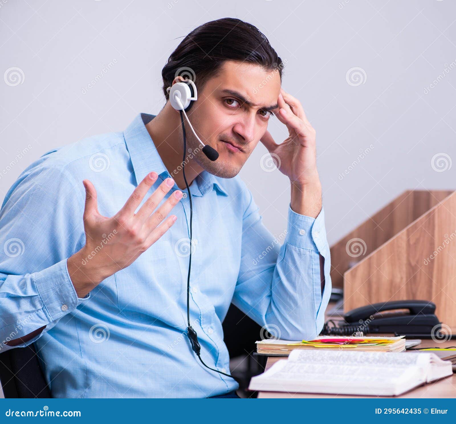 Call Center Operator Working at His Desk Stock Image - Image of call ...