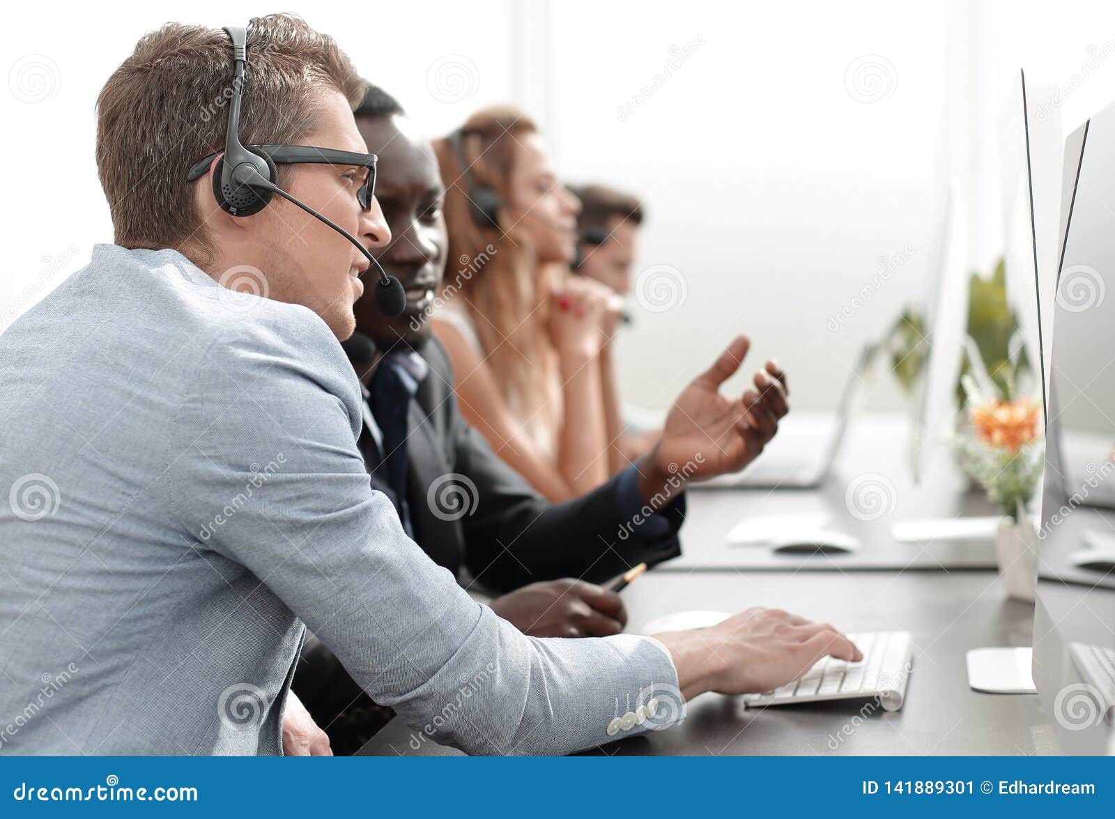 Call Center Operators are Talking, Sitting at His Desk Stock Image ...