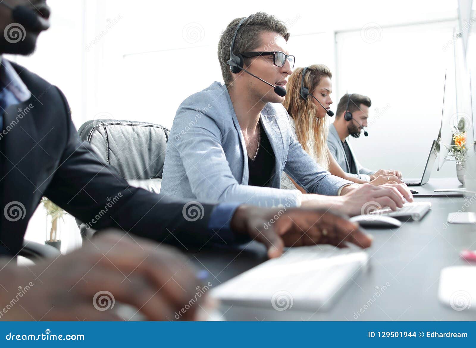 Call Center Staff Work in a Modern Office Stock Photo - Image of ...