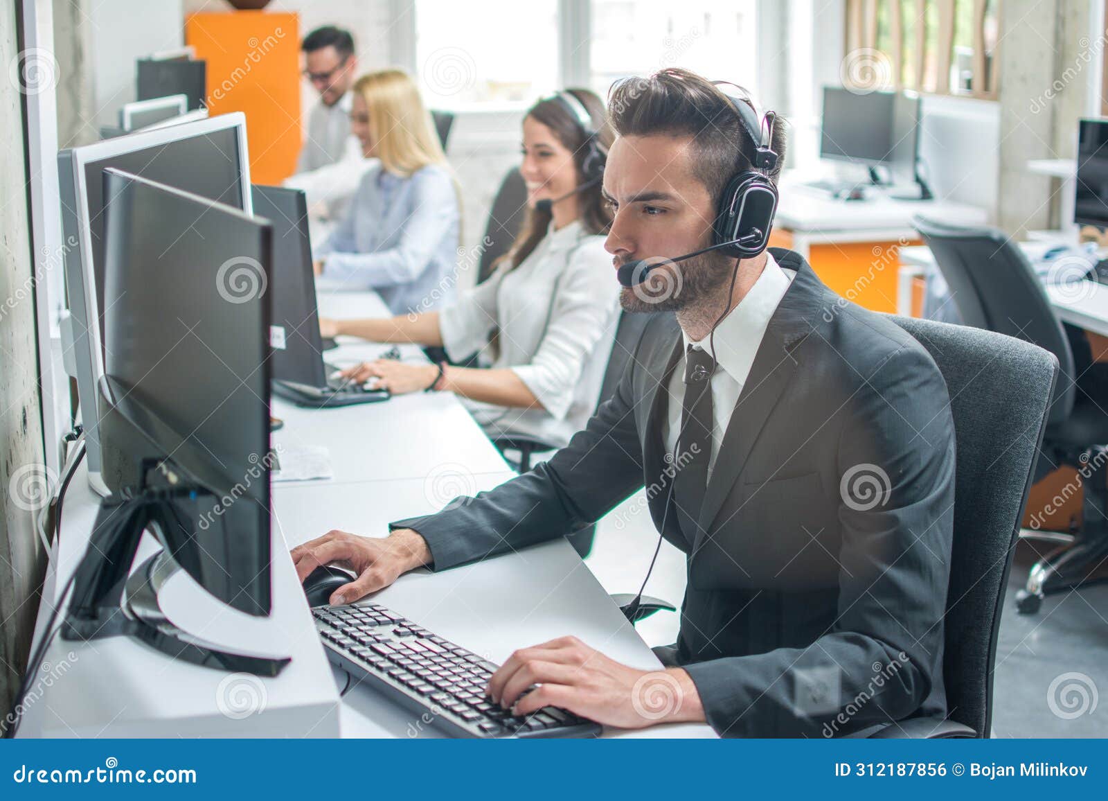 Call Center Team Talking with Customers. Stock Photo - Image of call ...