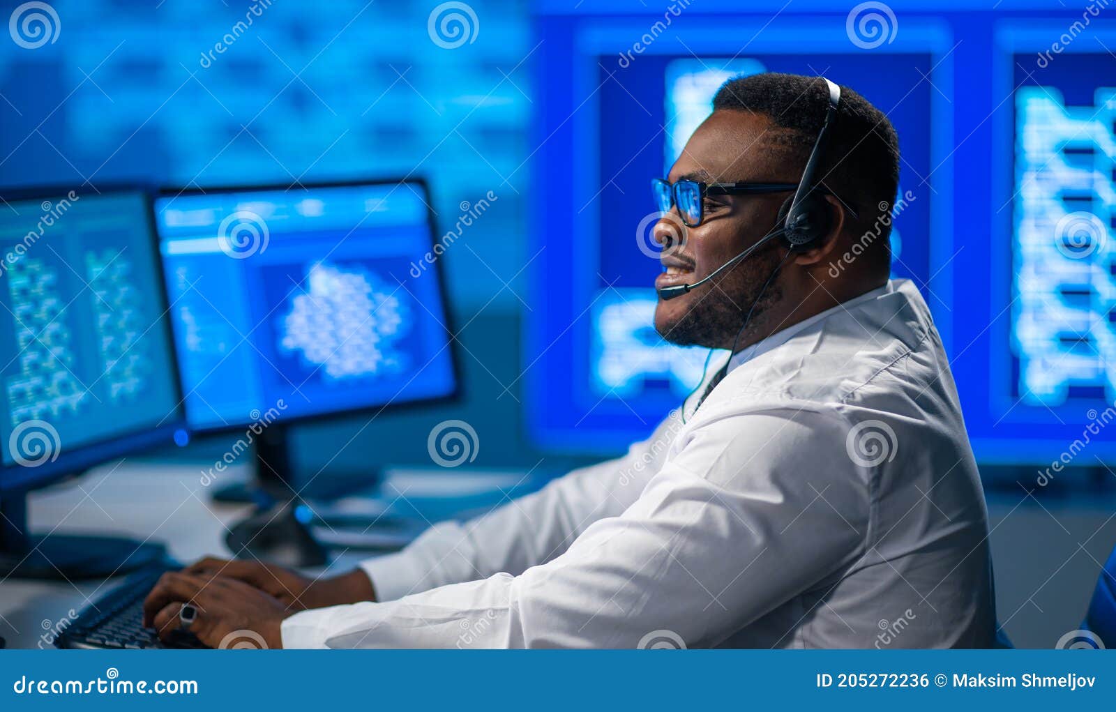Call-center Worker is Speaking with the Client by Headset. Workplace of ...