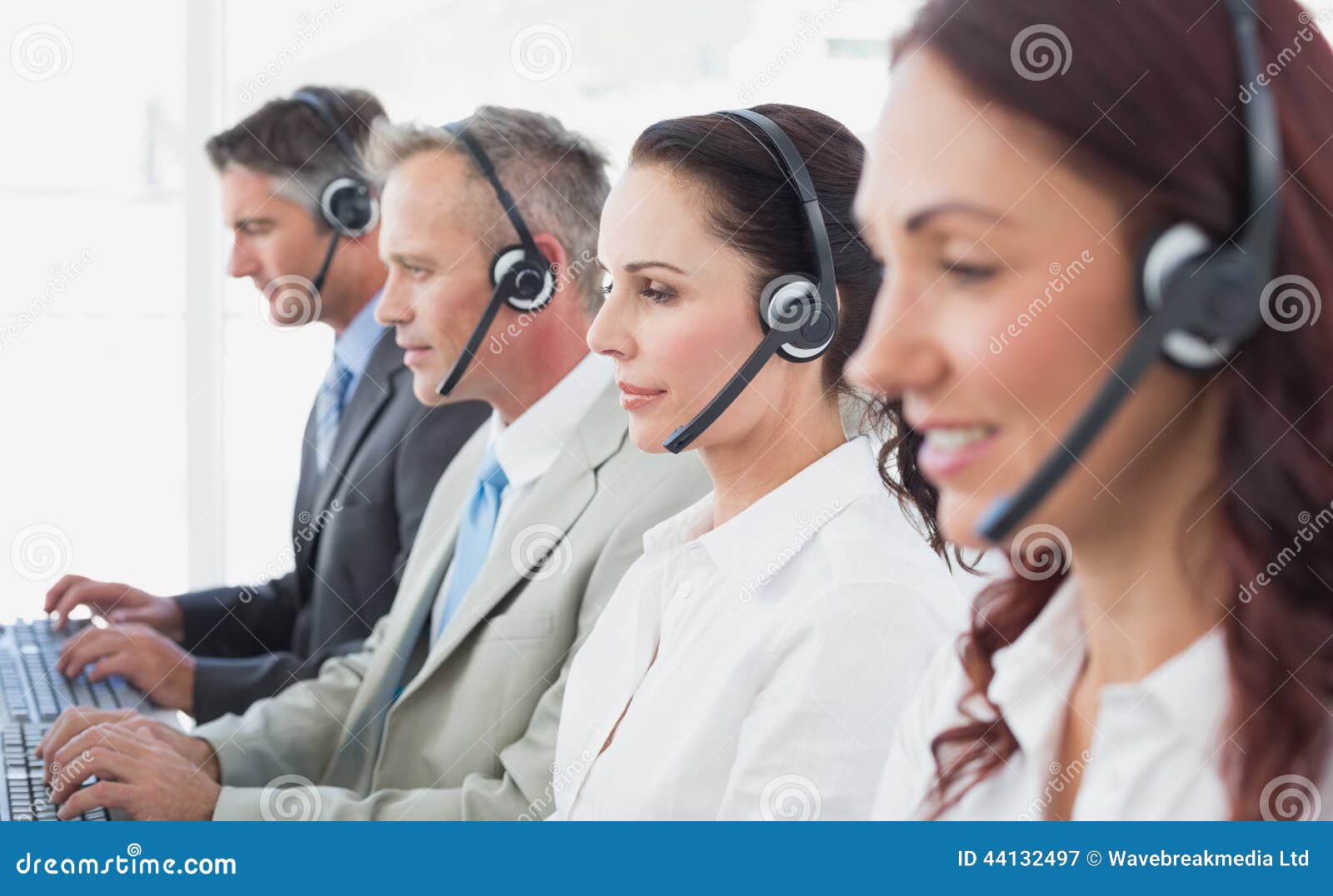 Call Center Workers Wearing Headsets Stock Image - Image of caucasian ...