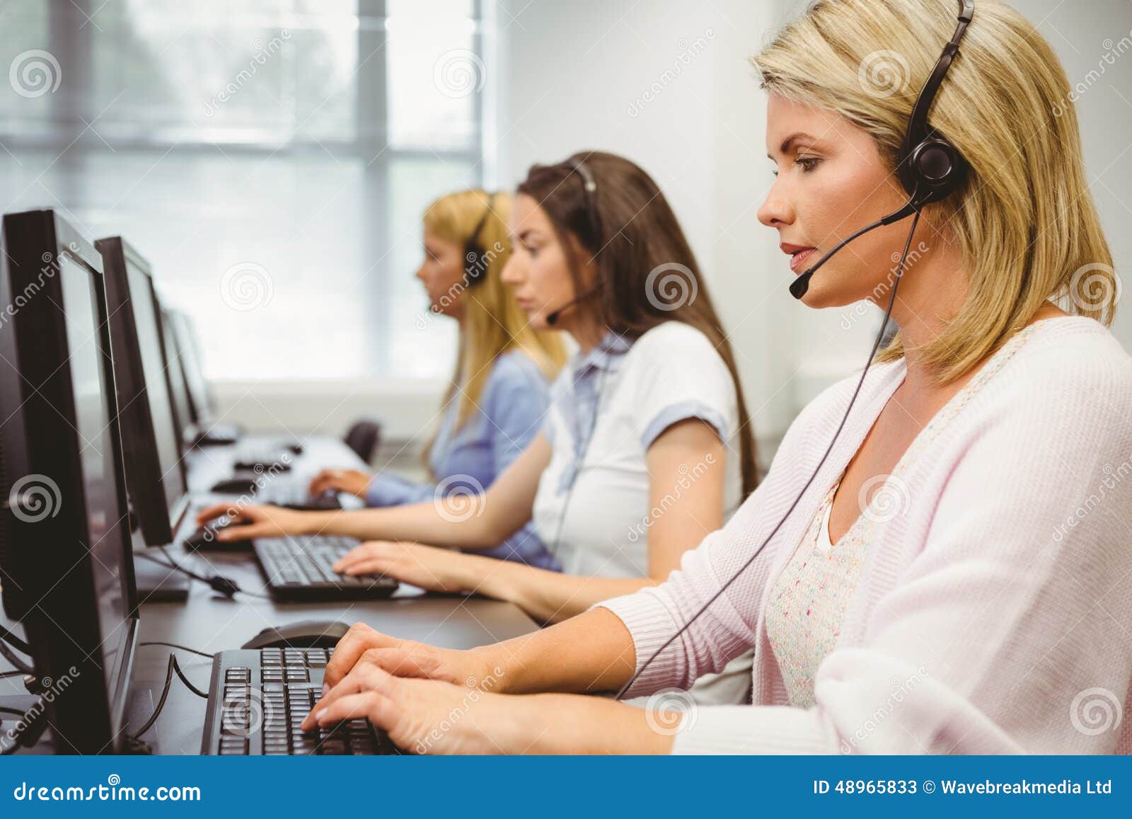 Call Centre Agents Talking on the Headset Stock Image - Image of ...