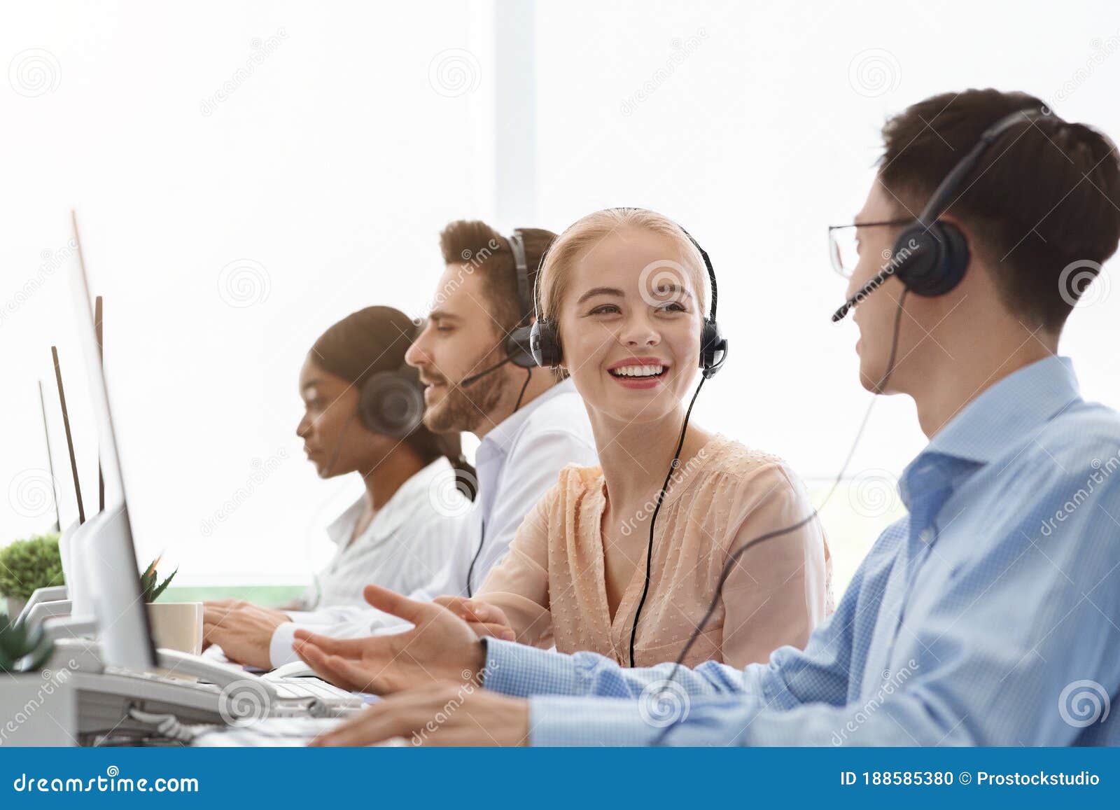 Call Centre and Customer Service. Tech Support Operators Discussing ...