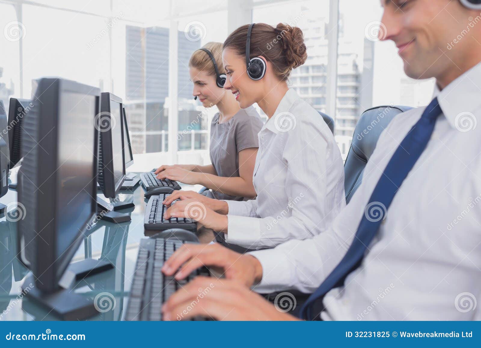 Call Centre Employees at Work Stock Image - Image of male ...