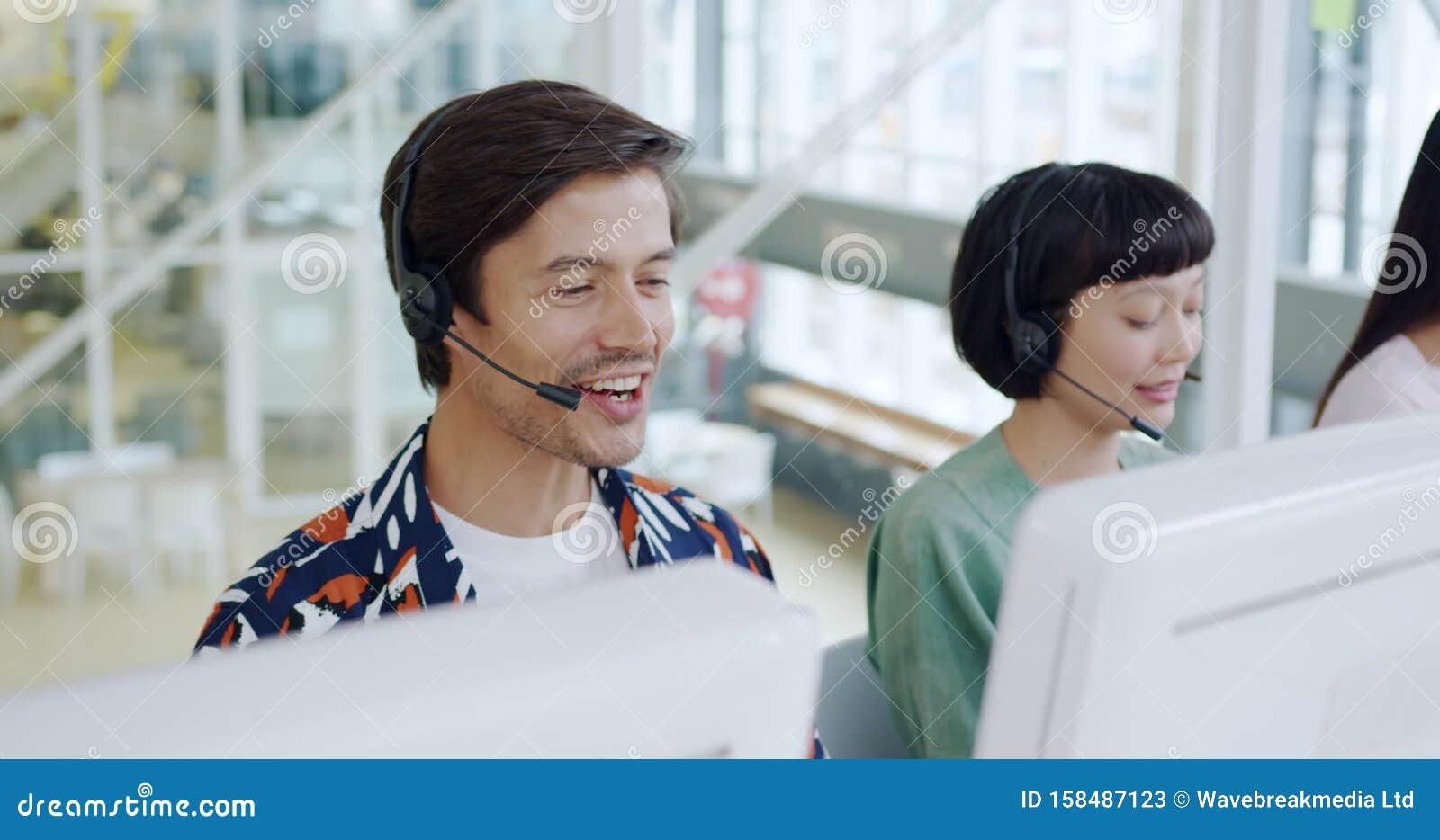 Call Centre Staff Working in a Modern Office Stock Video - Video of ...