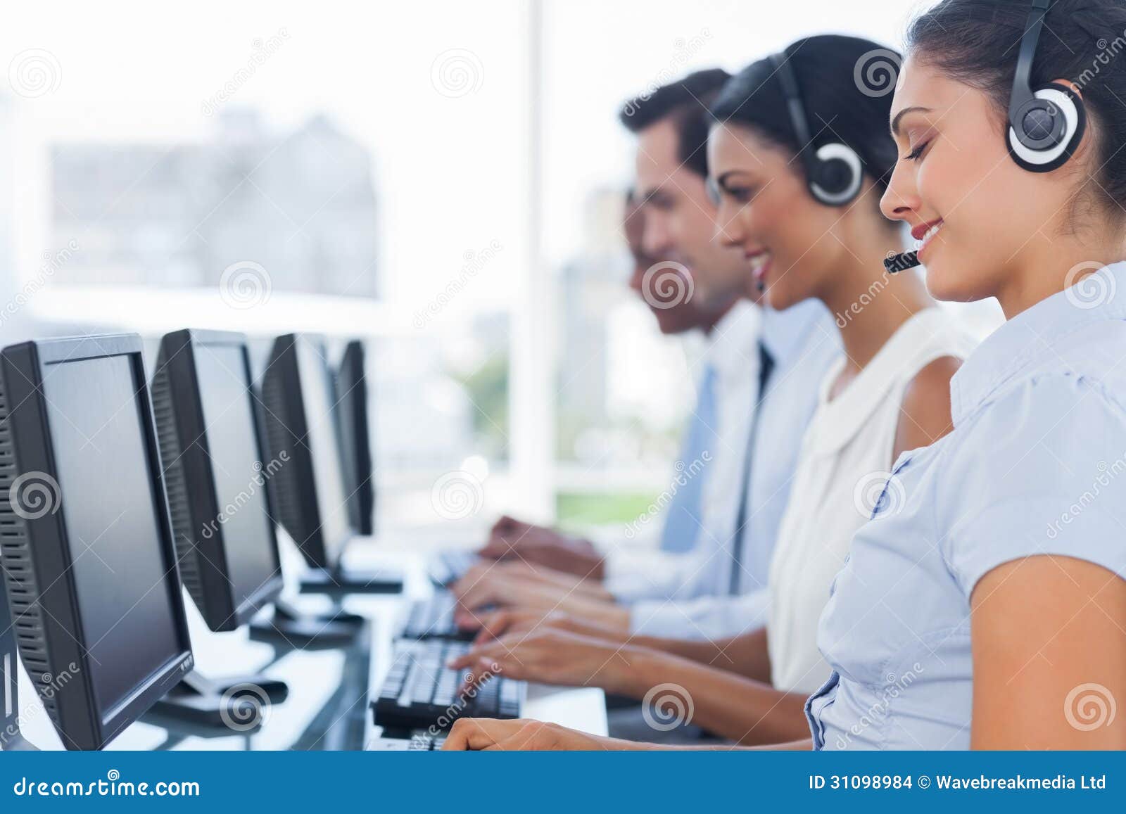 Call Centre Workers Working in Line Stock Photo - Image of staff ...