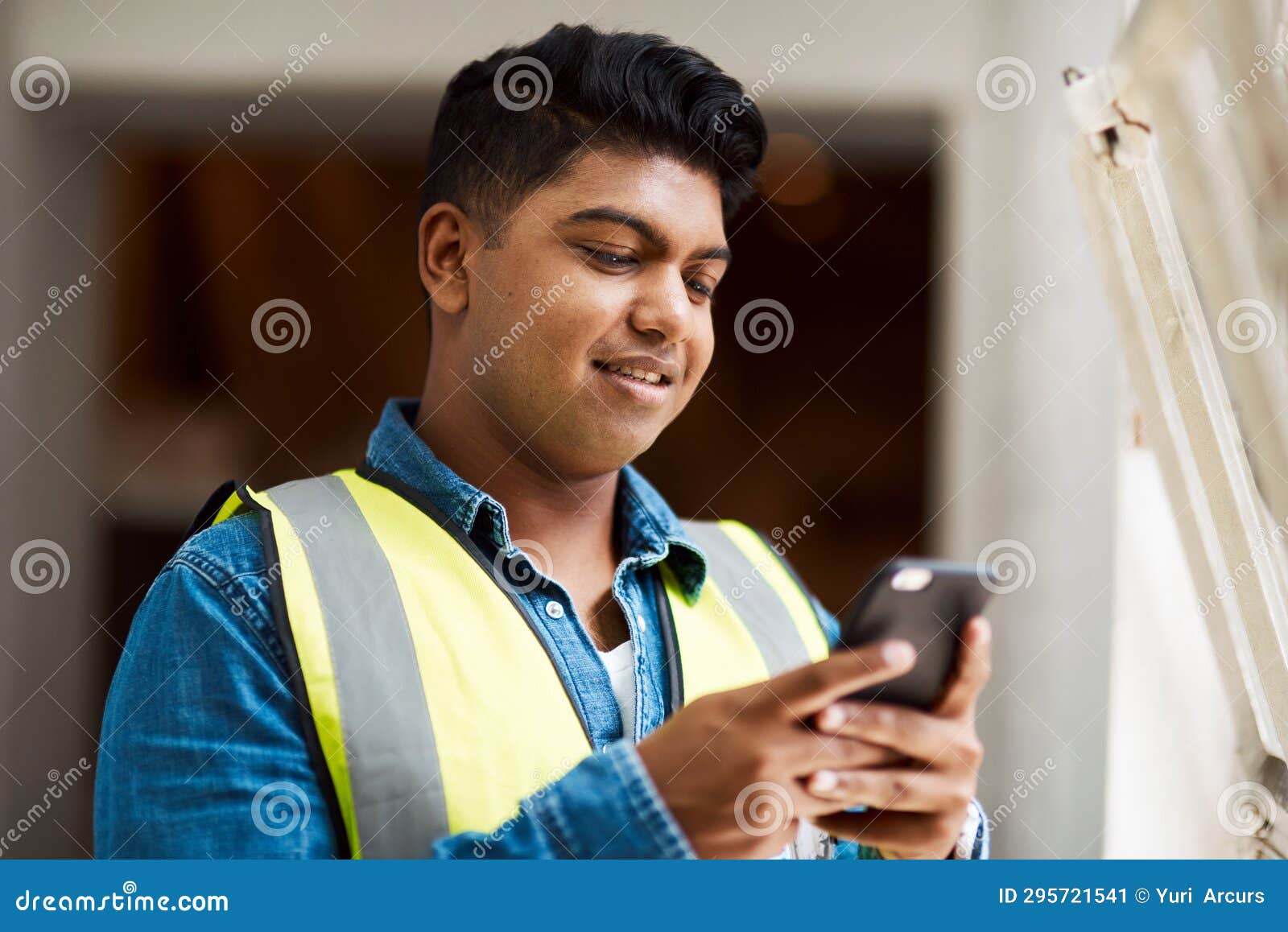 Call Me for All Your Construction Needs. a Engineer Using His Cellphone ...