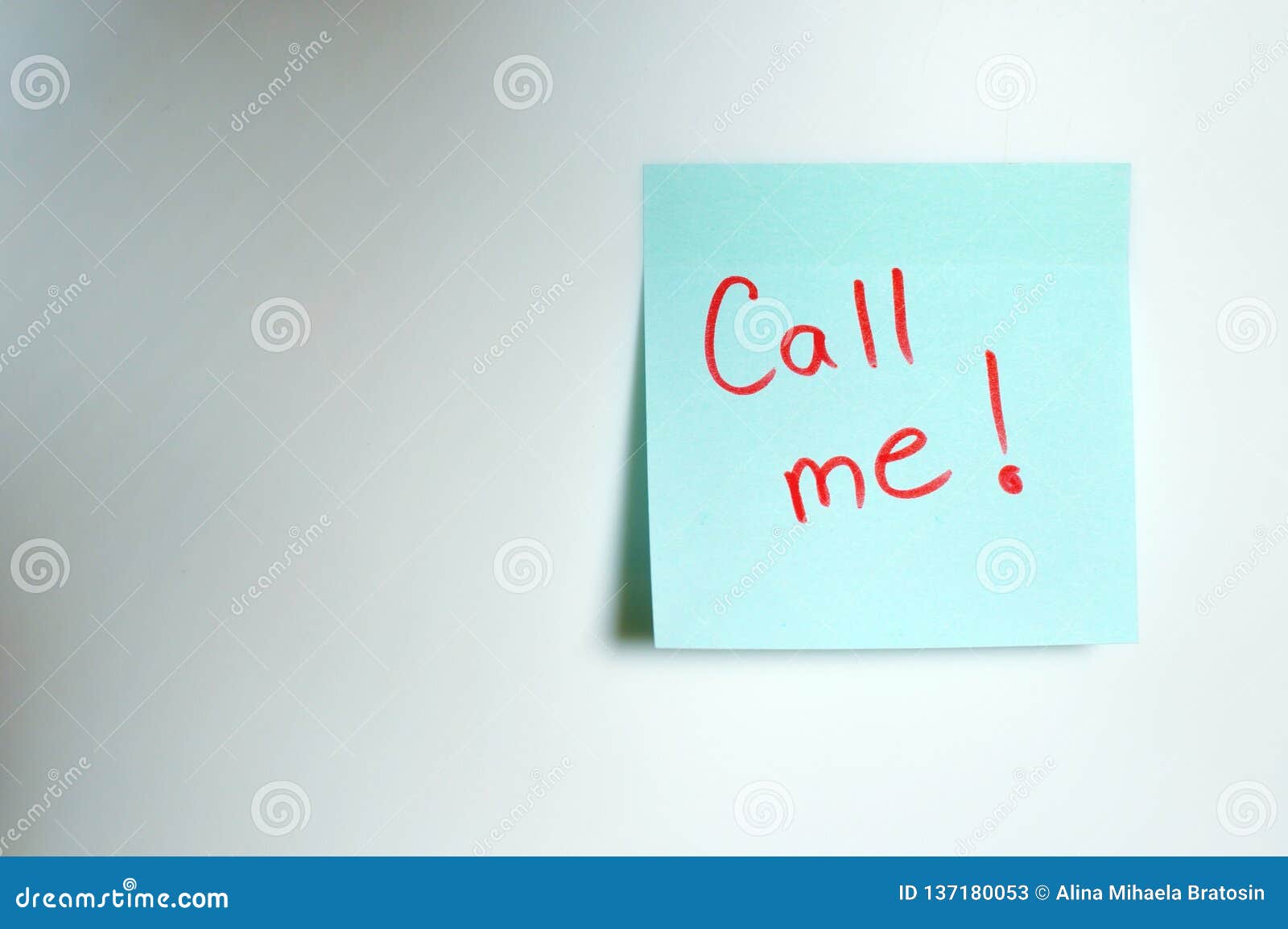 Call Me Written by Hand and Put on the White Wall Stock Image - Image ...