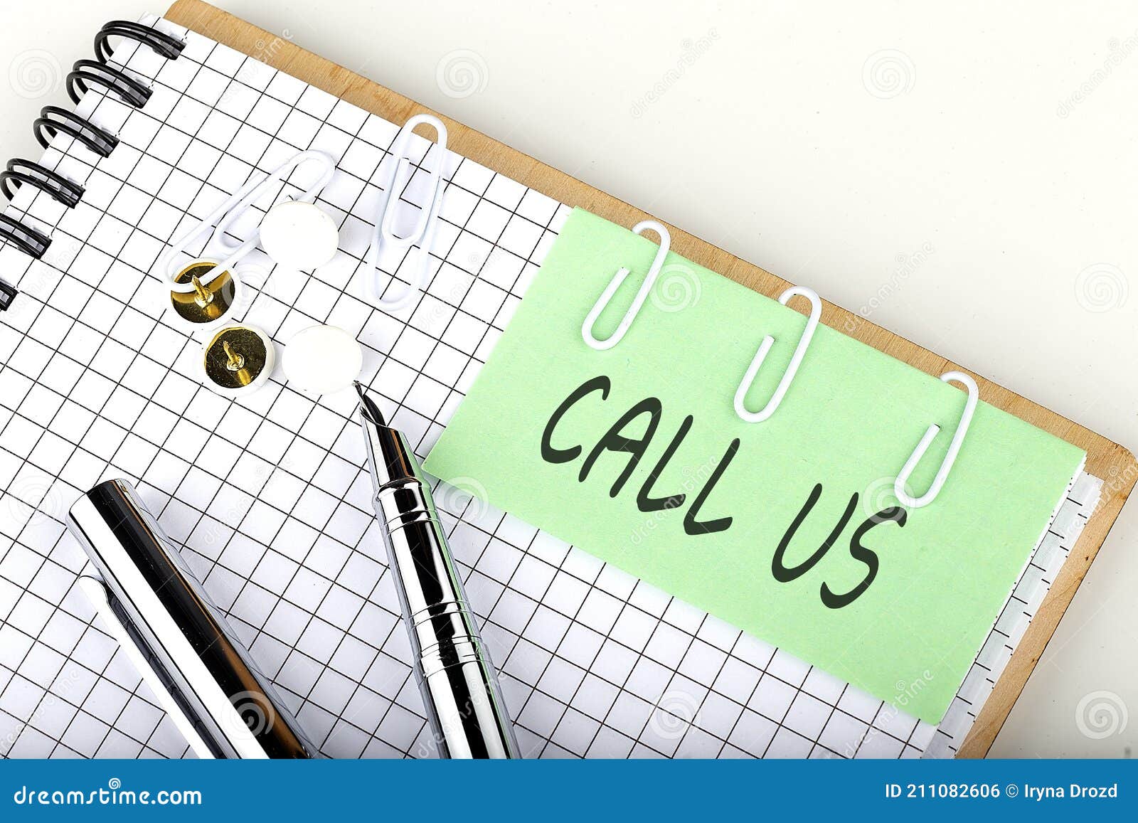 CALL US on Post Note for Remind on the Stickers with Pen Stock Photo ...