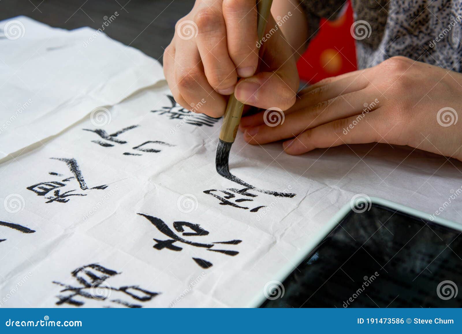 A Calligrapher is Creating Calligraphy and Writing Calligraphy Stock ...