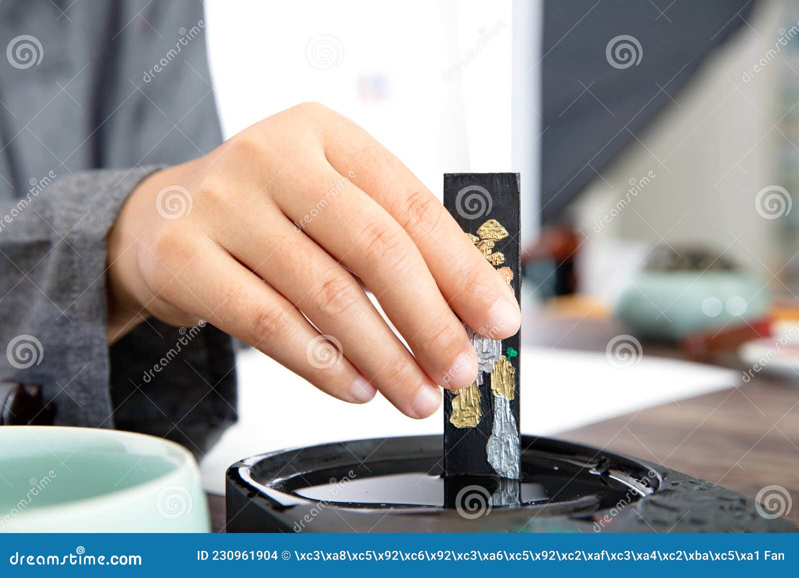 The Calligrapher is Studying Ink on the Inkstone with Ink Sticks in ...