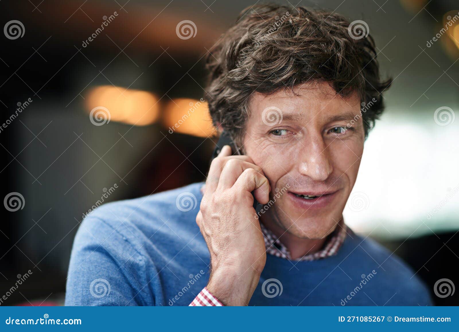Calling a Client. a Businessman Using His Cellphone at Work in an ...