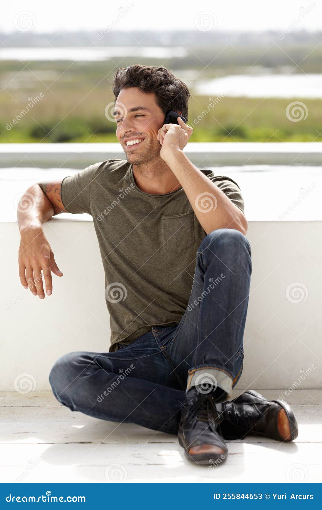 Calling Friends and Relaxing Outside. a Handsome Young Making a Call ...