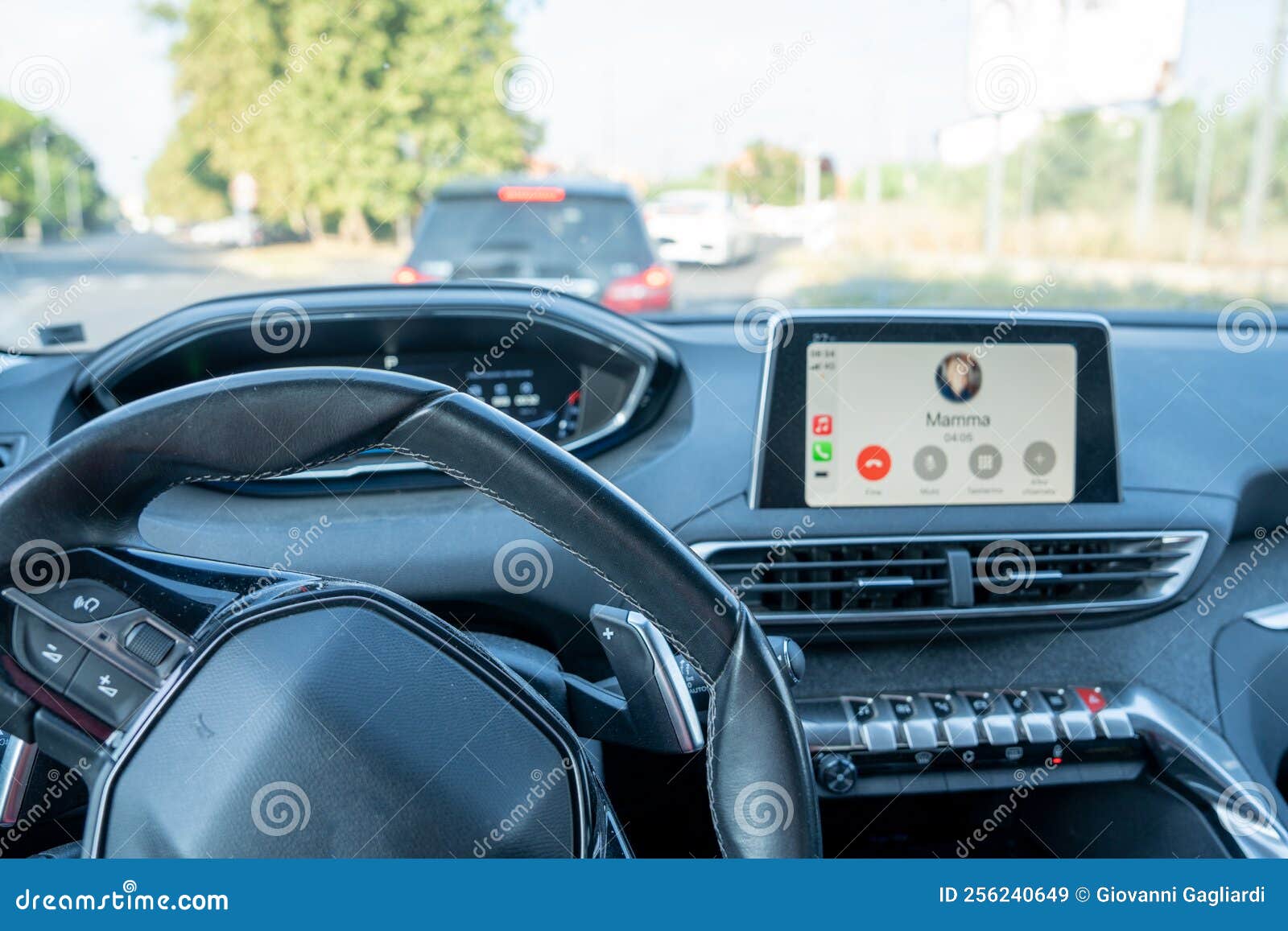 Calling from a Modern Concept Car. Mobile Phone Connected with Main Car ...