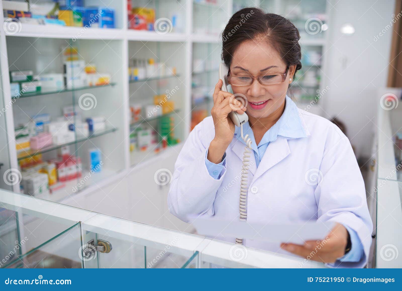 Calling To Medical Warehouse Stock Photo - Image of woman, pharmacy ...