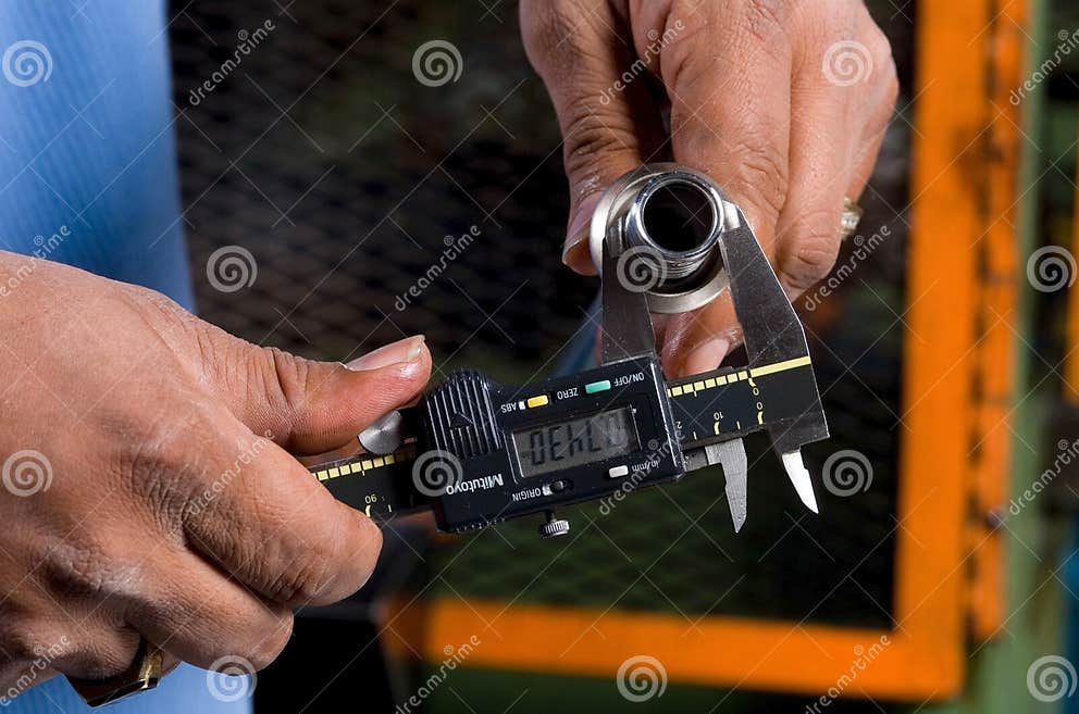 Calliper Measuring an Iron Bar Stock Image - Image of nonius, caliper ...