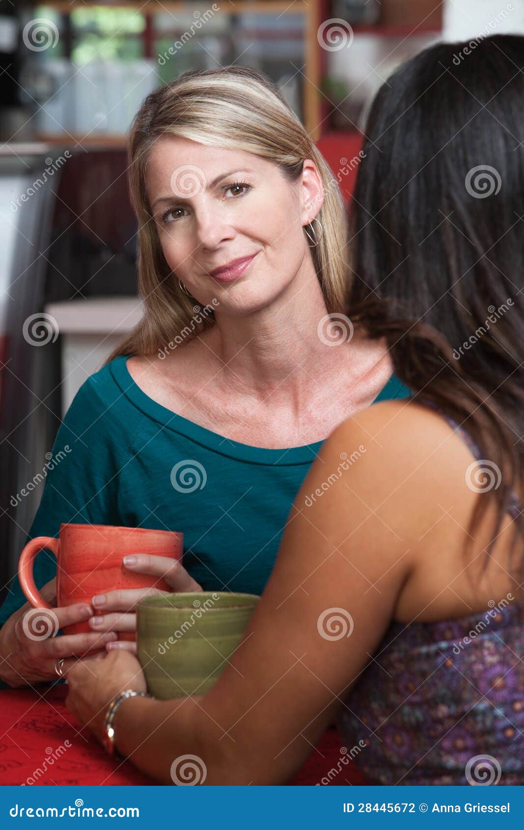 Calm Blond Woman with Friend Stock Photo - Image of calm, admiring ...