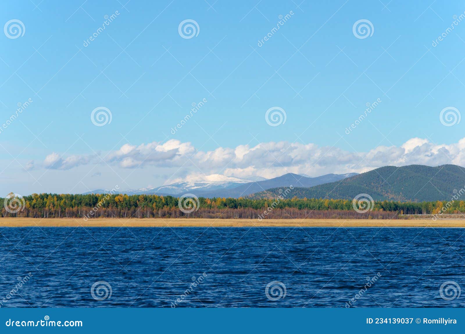 Calm Blue River. in the Background are Mountains and Mixed Forest ...
