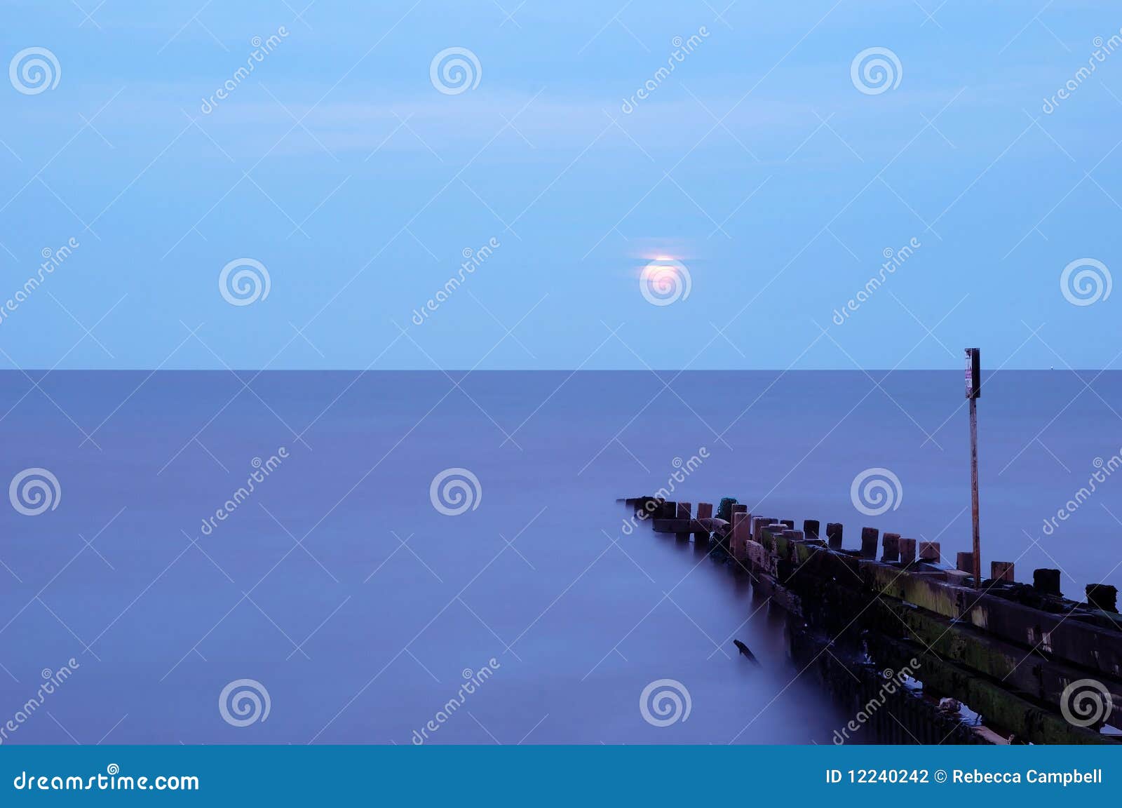 Calm blue sea stock photo. Image of groyne, moonlight - 12240242