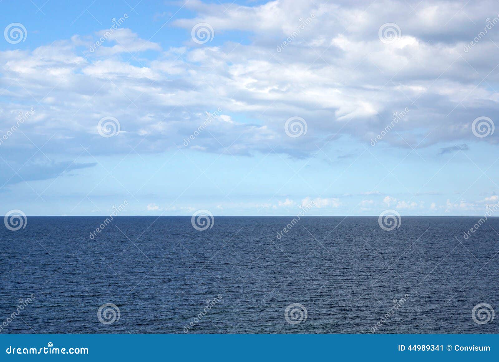 Calm blue sea stock image. Image of horizon, clouds, distance - 44989341