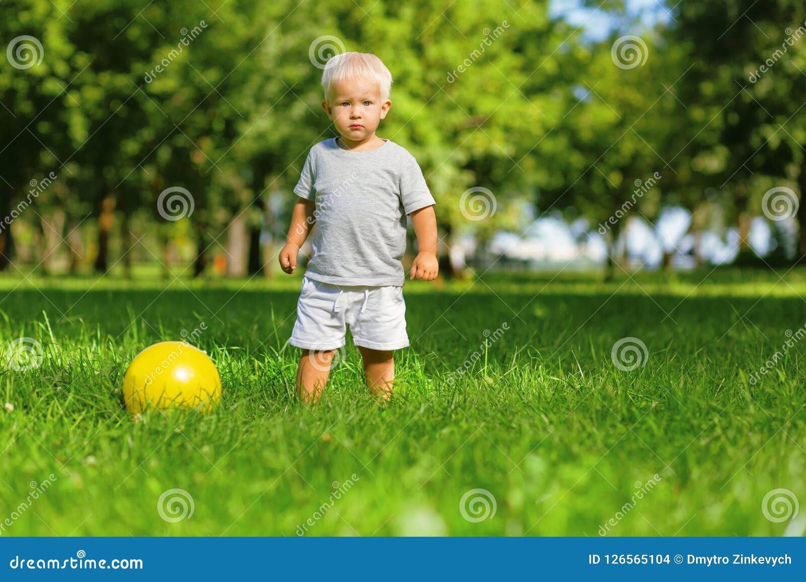 Calm Kid Playing with the Ball Outside Stock Photo - Image of happy ...