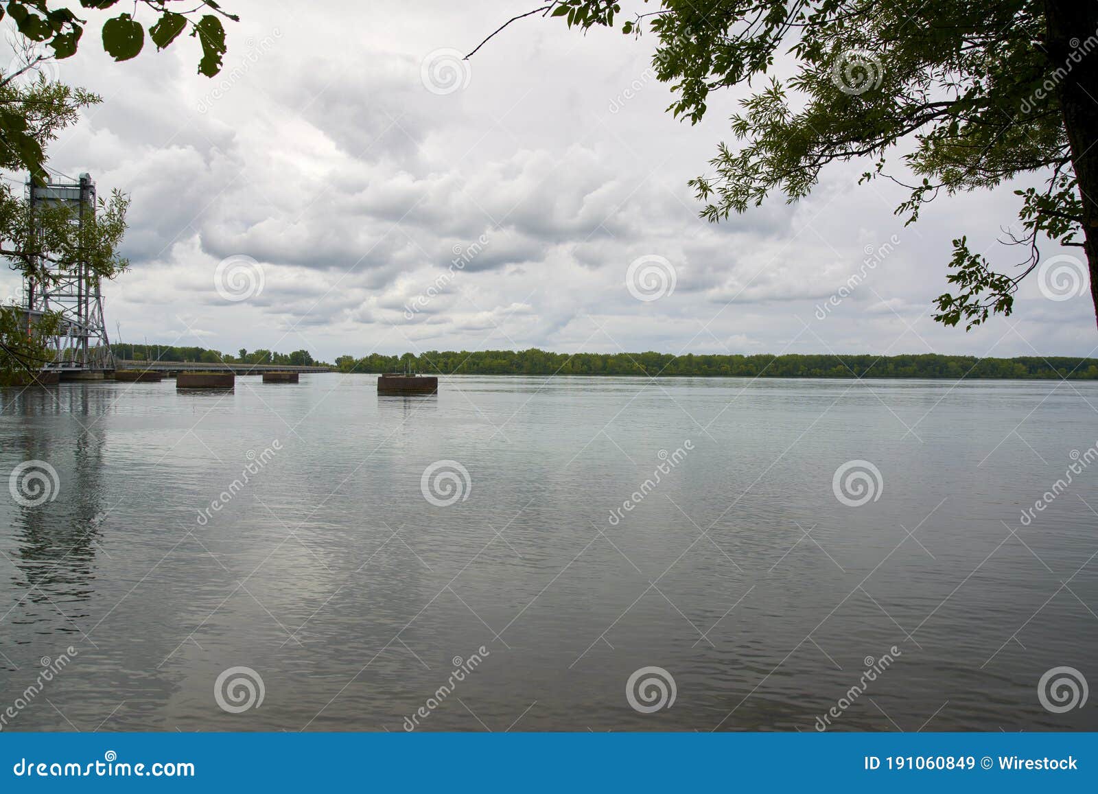 Calm Lake Gleaming Under the Cloudy Sky in Montreal, Canada Stock Image ...