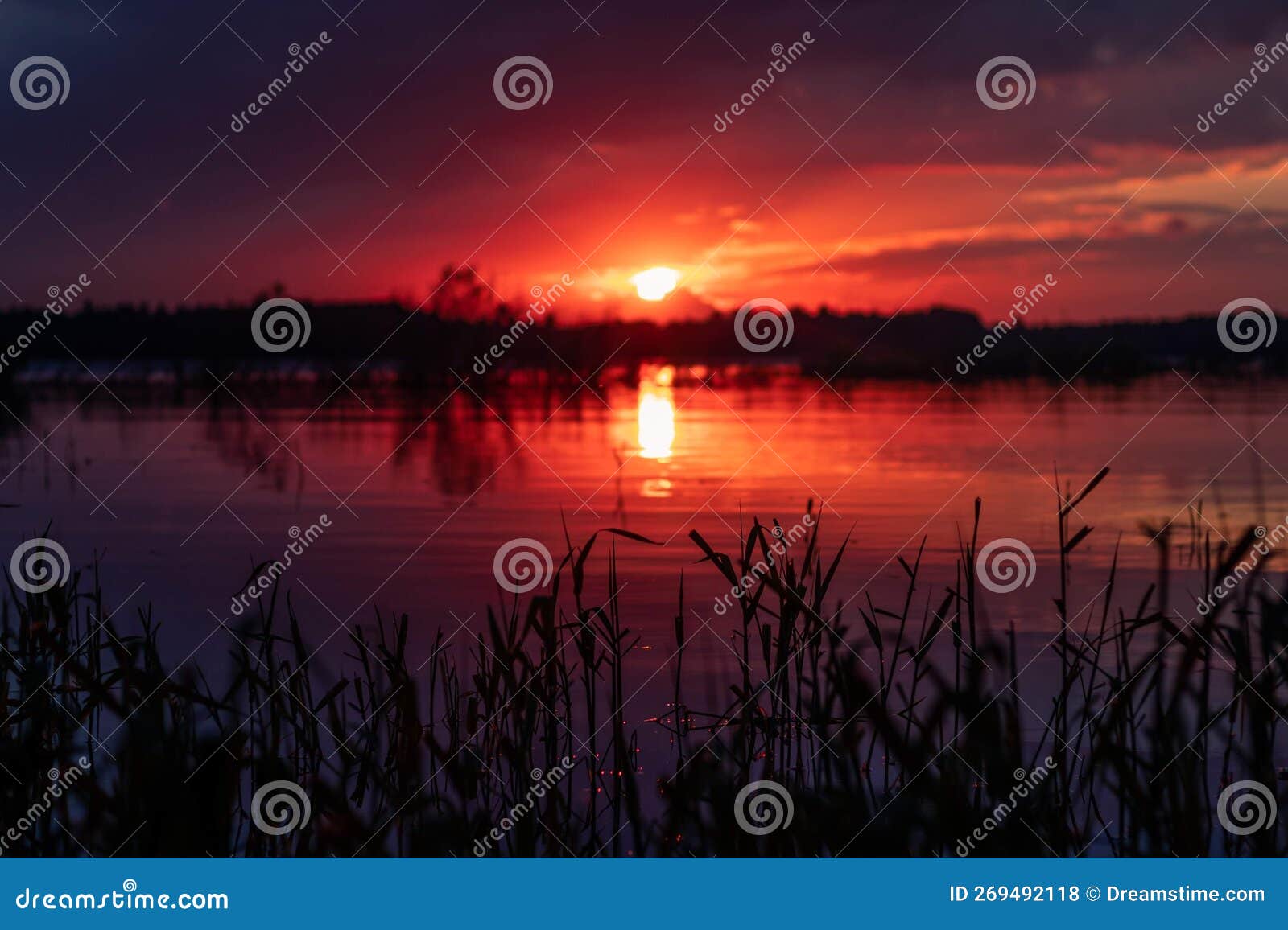 Calm Lake Sunset Reflection Stock Photo - Image of sunset, reflection ...