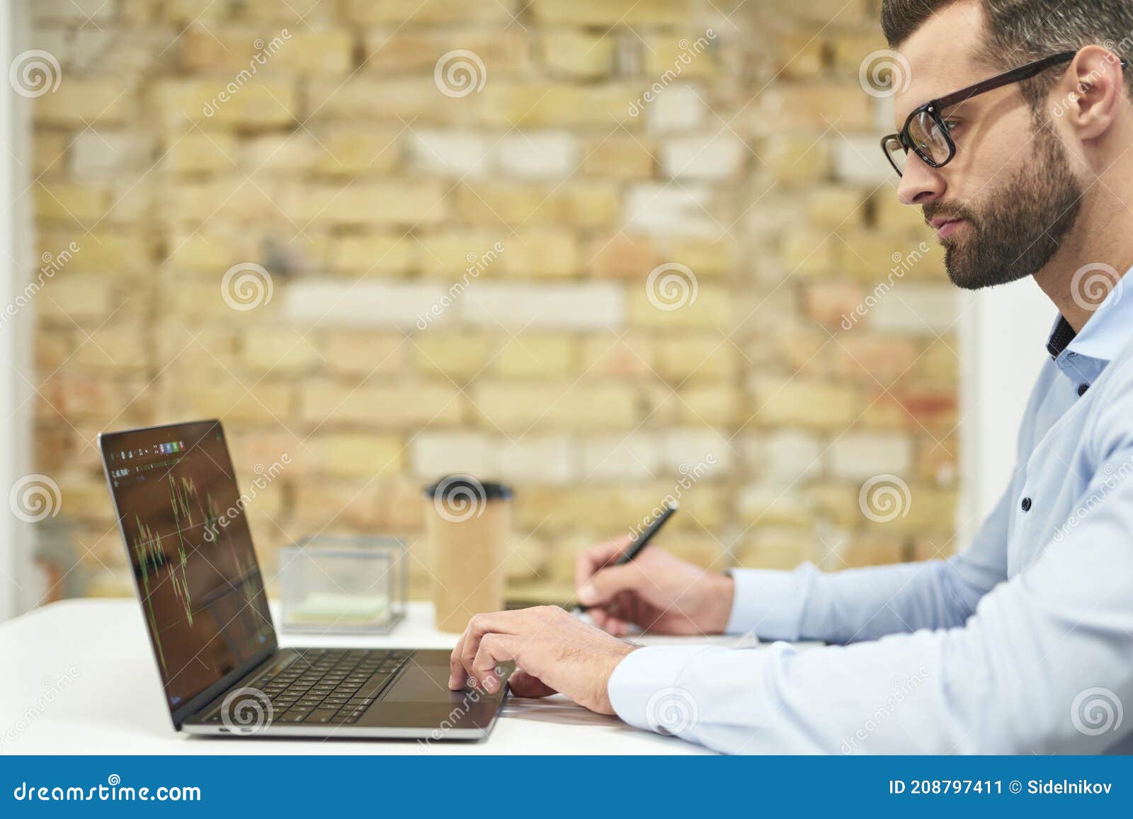 Calm Manager Analyzing the Information at His Workplace Stock Image ...