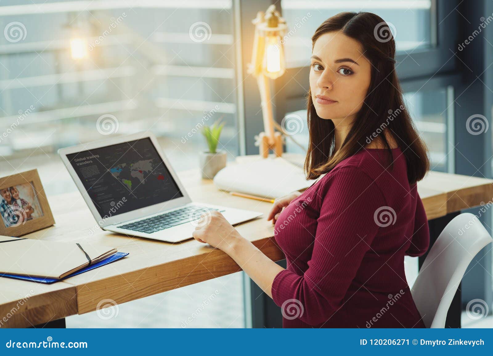 Calm Manager Sitting at the Table and Working on Her Laptop Stock Image ...