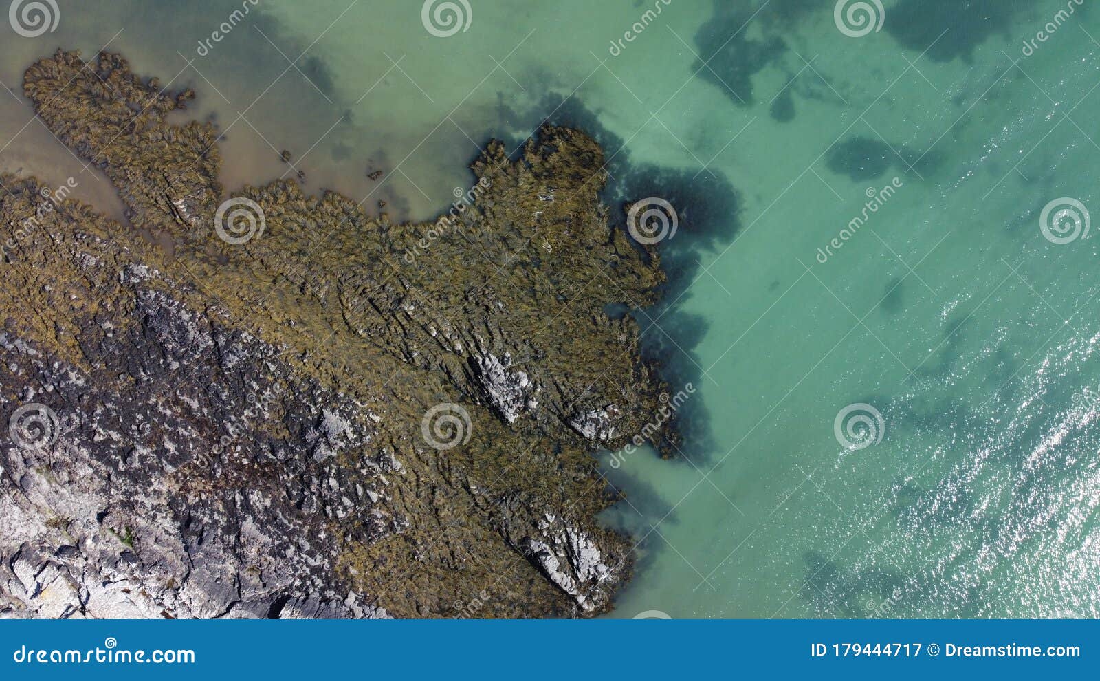 Calm Ocean of Azure Color and Rocks Stock Image - Image of v02430128 ...