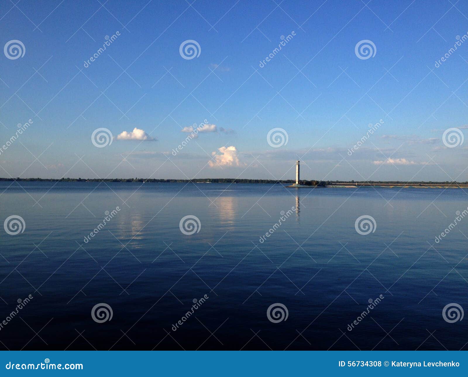 Calm sea and lighthouse stock photo. Image of scene, nautical - 56734308