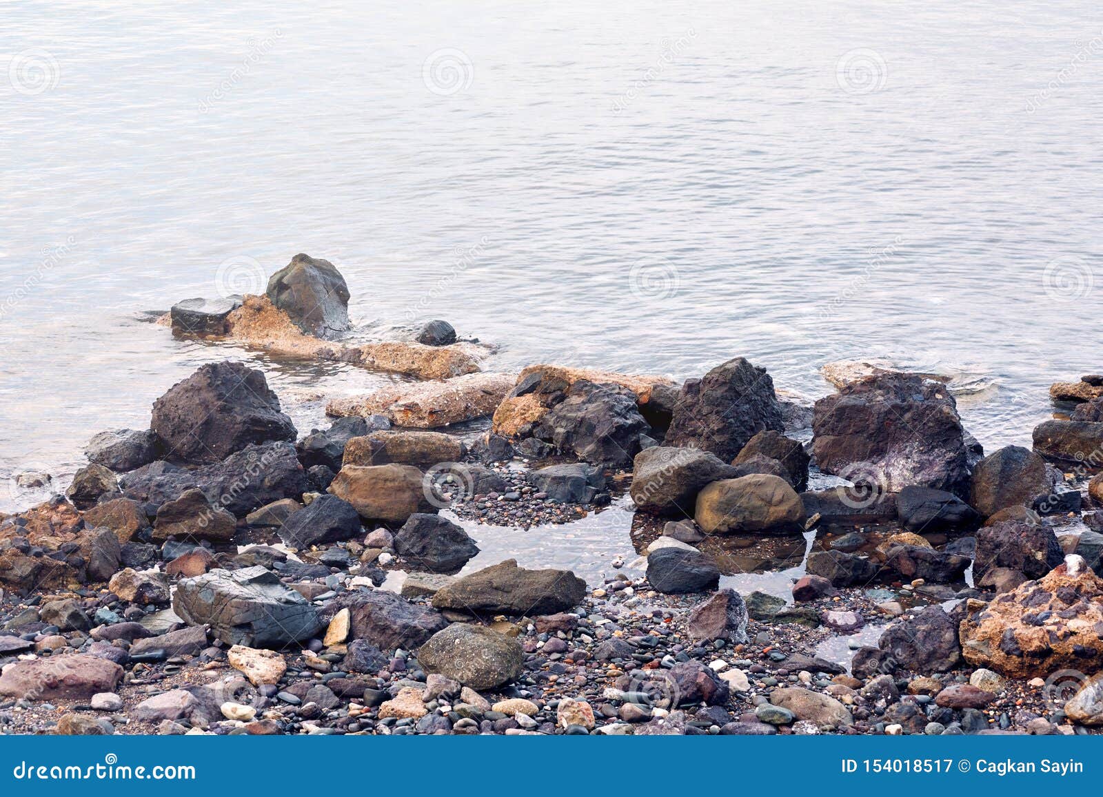 Calm Sea, Rocks and Pebble Stones Stock Image - Image of blue ...