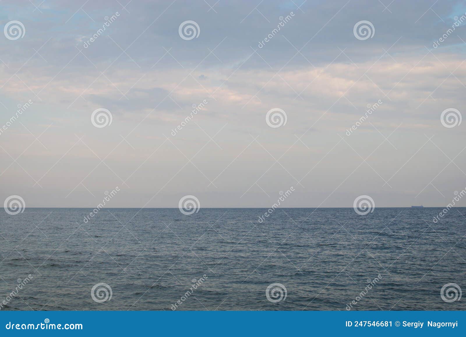 Calm Sea with a Ship Sailing in the Distance Stock Image - Image of ...
